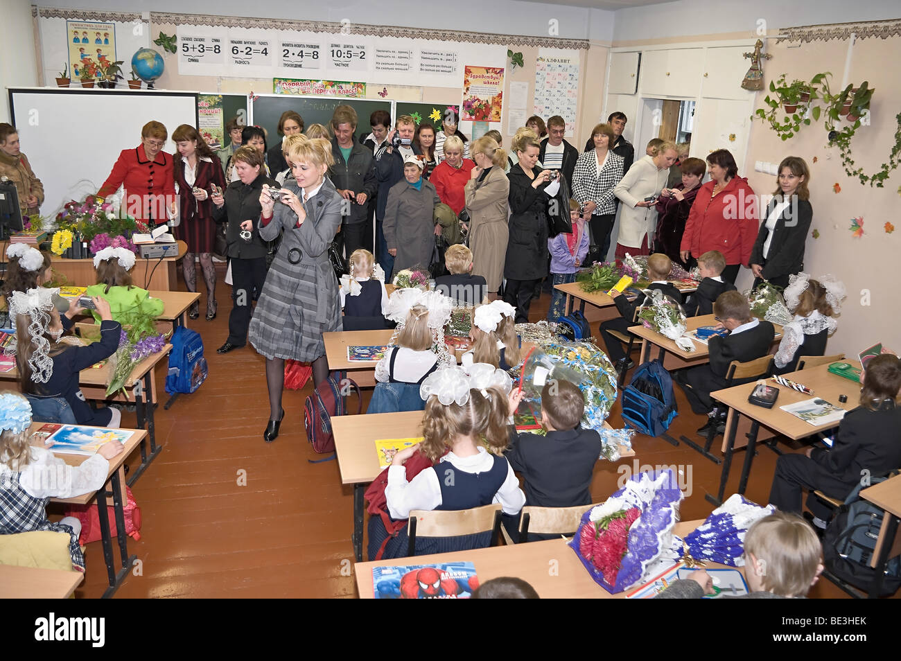 Parents bring children in classroom at September, 1. First time in ...