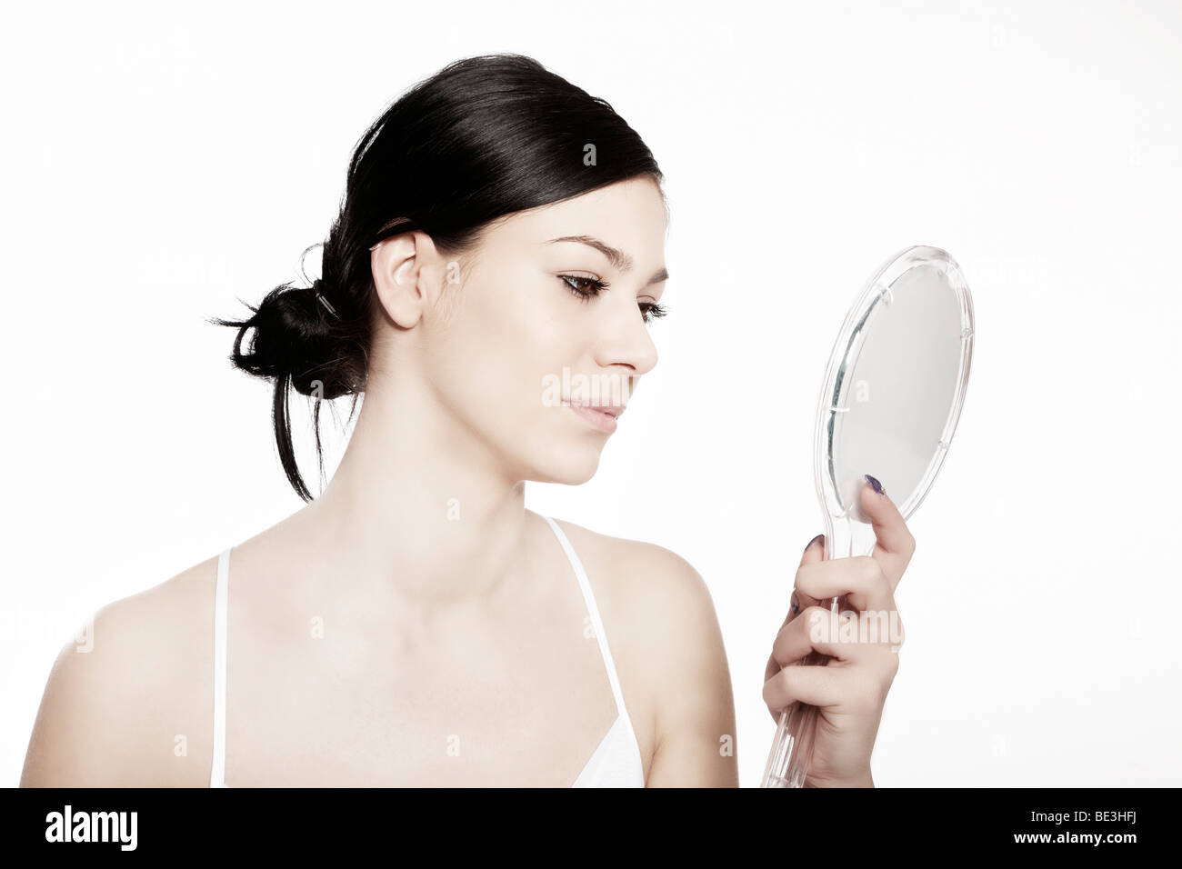 Hand holding compact mirror hi-res stock photography and images - Alamy