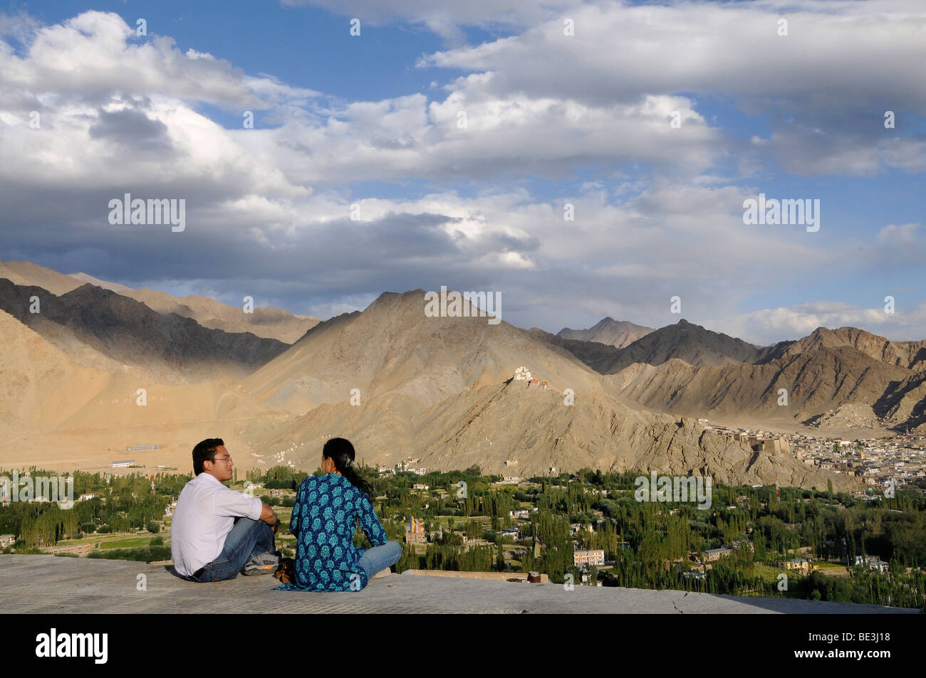 Ladakhi people looking on the Leh oasis with Gonkhang monastery and ...