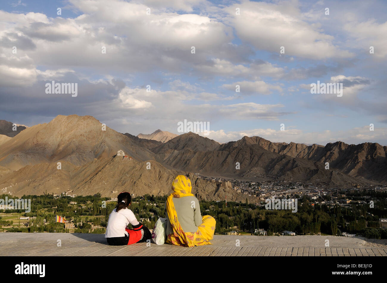 Ladakhi people looking on the Leh oasis with Gonkhang monastery and ...