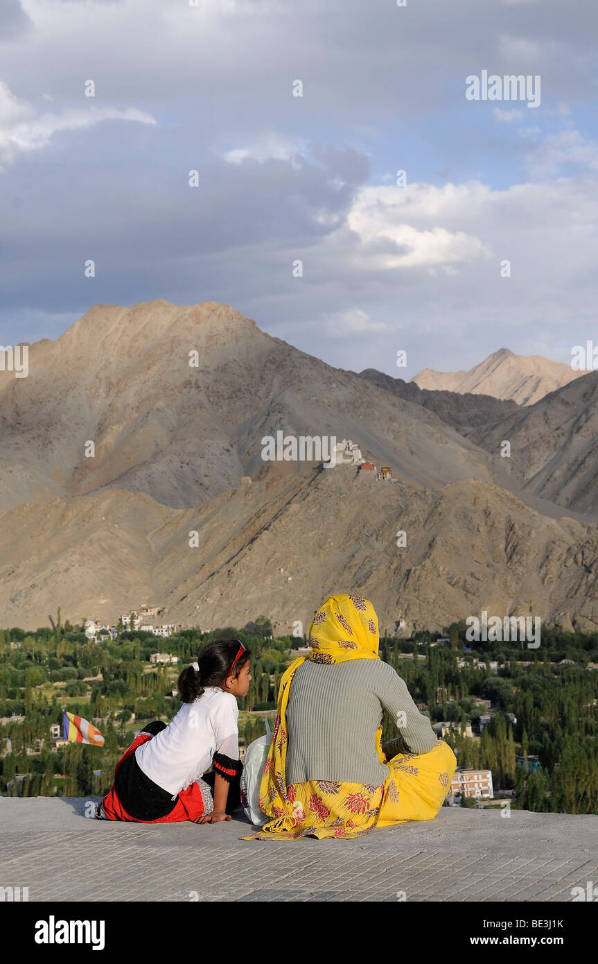 Ladakhi people looking on the Leh oasis with Gonkhang monastery and ...