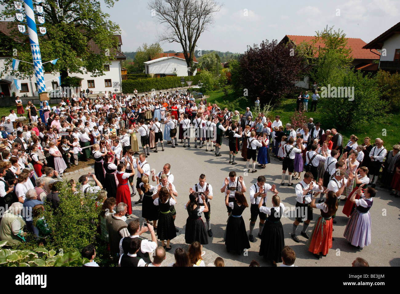 Dance around maypole traditional costume hi-res stock photography and ...