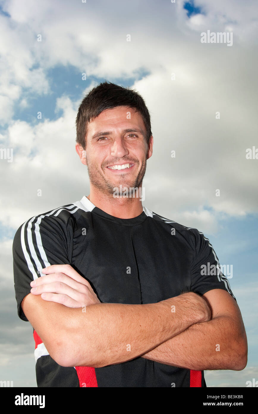Smiling footballer hi-res stock photography and images - Alamy