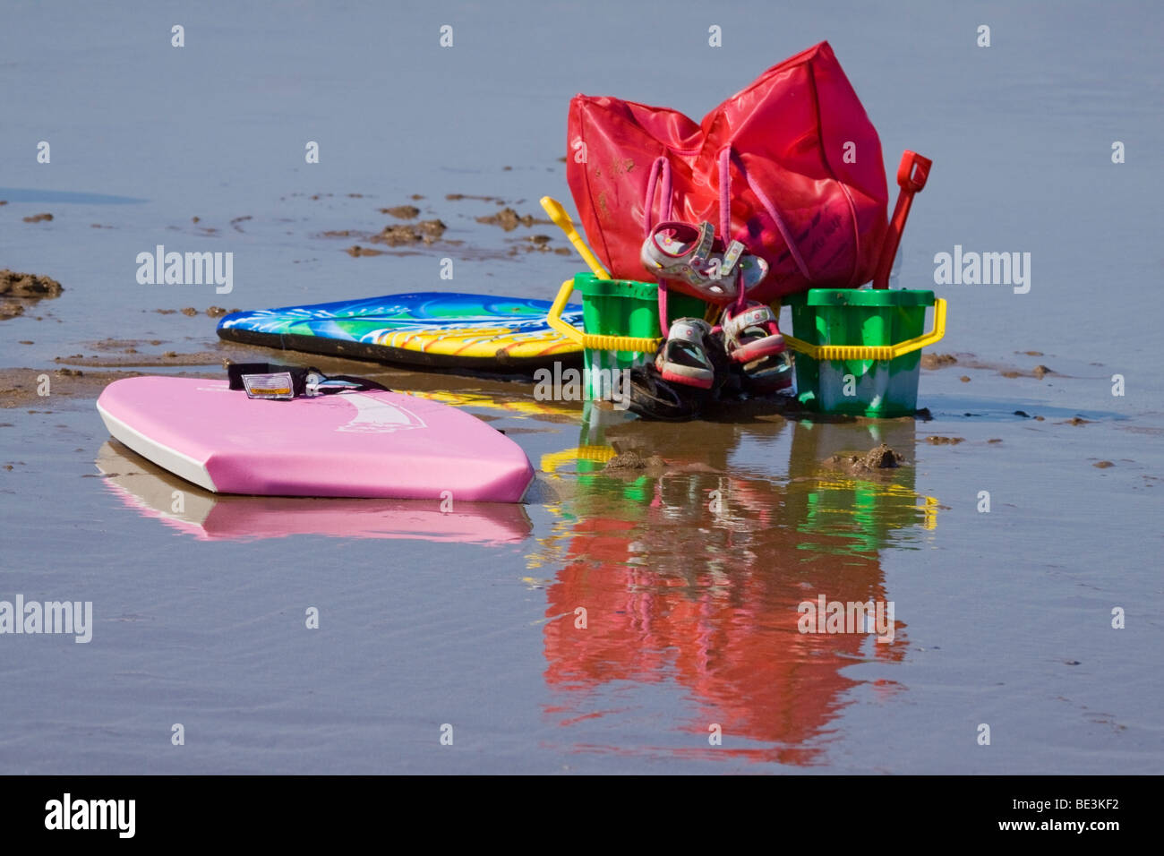 paraphernalia left on the beach while the owners go for a swim Stock ...