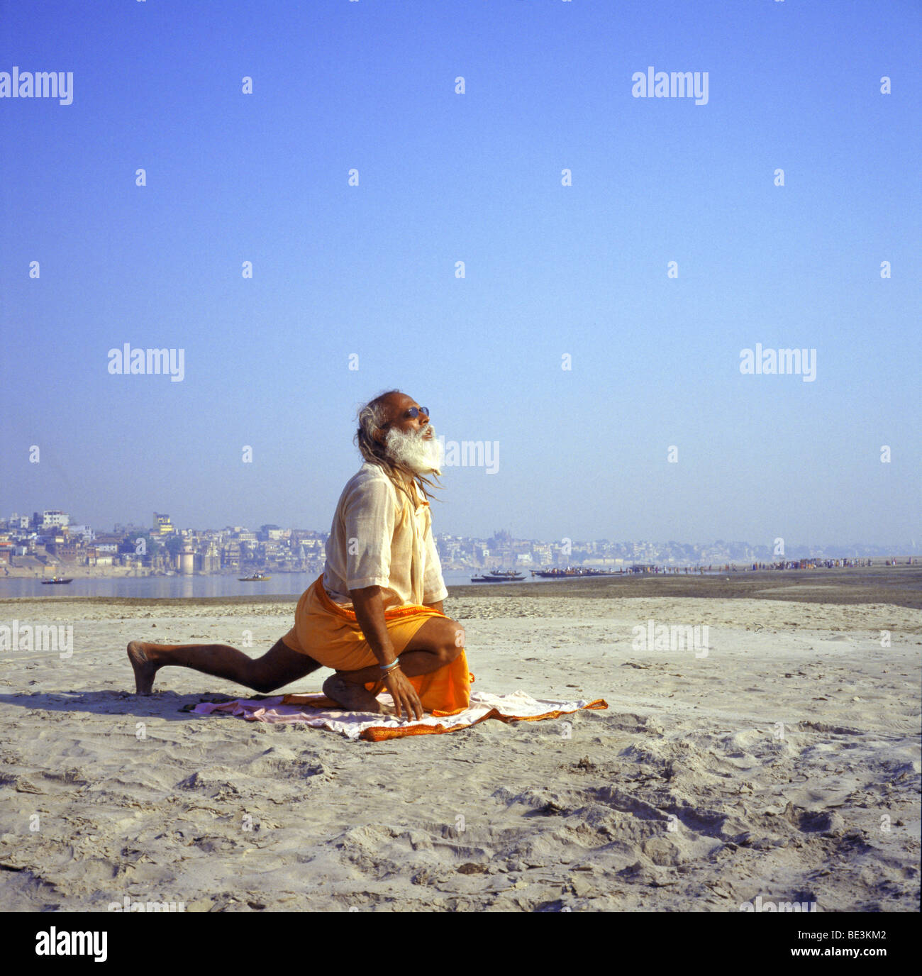 A Sadhu performs a Sun Salutation at Varanasi, India Stock Photo - Alamy