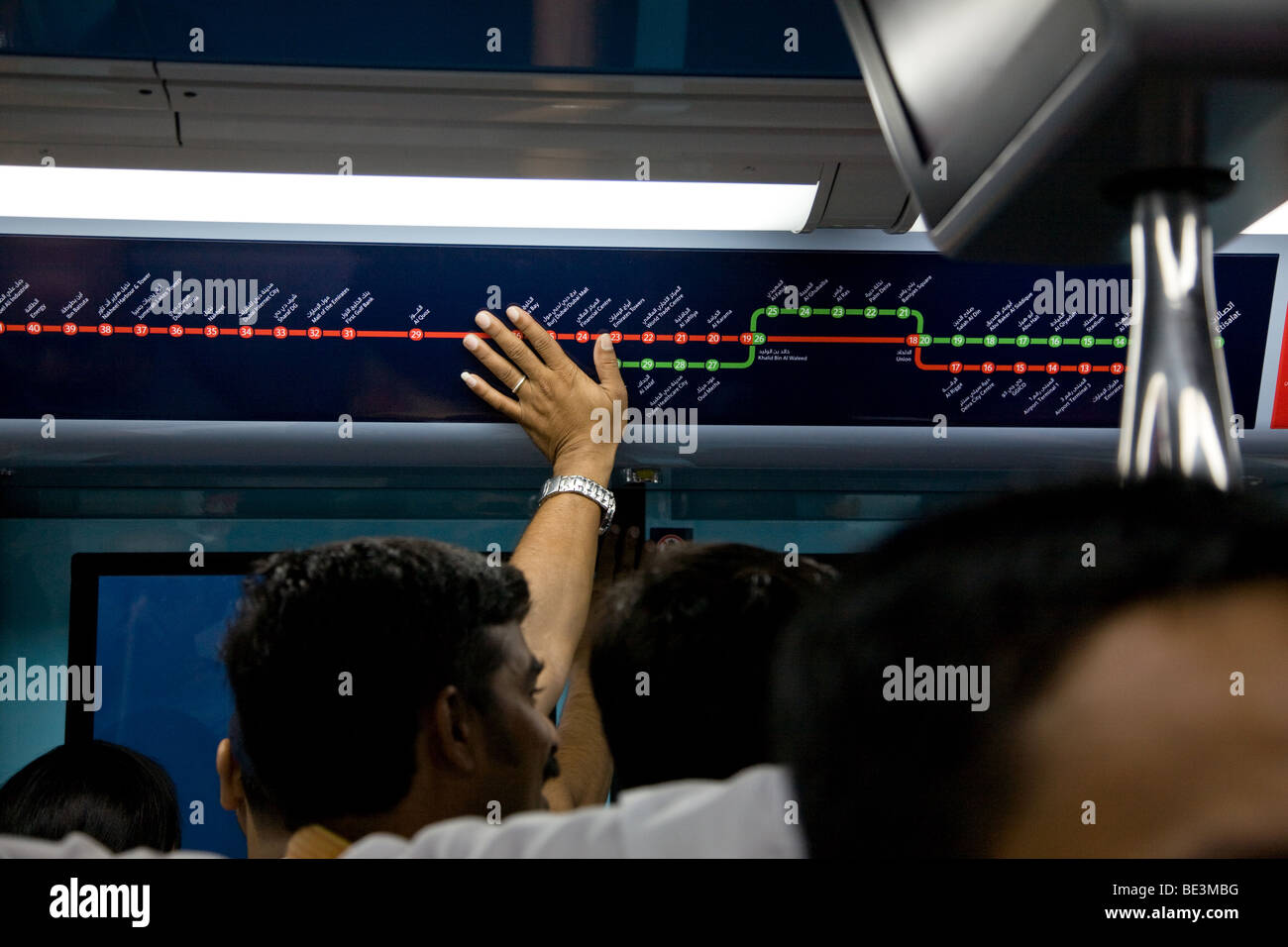 rush hour commuters dubai metro train overcrowding Stock Photo - Alamy