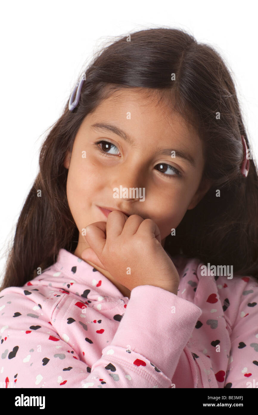 Portrait of a wondering little girl Stock Photo - Alamy