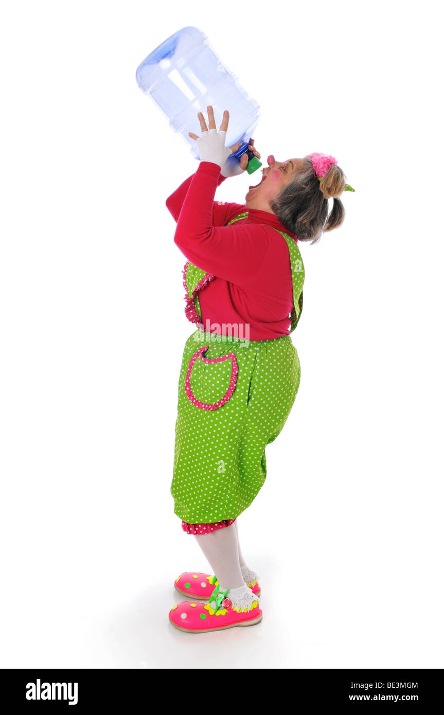 Clown drinking from a big water bottle isolated on white Stock Photo ...