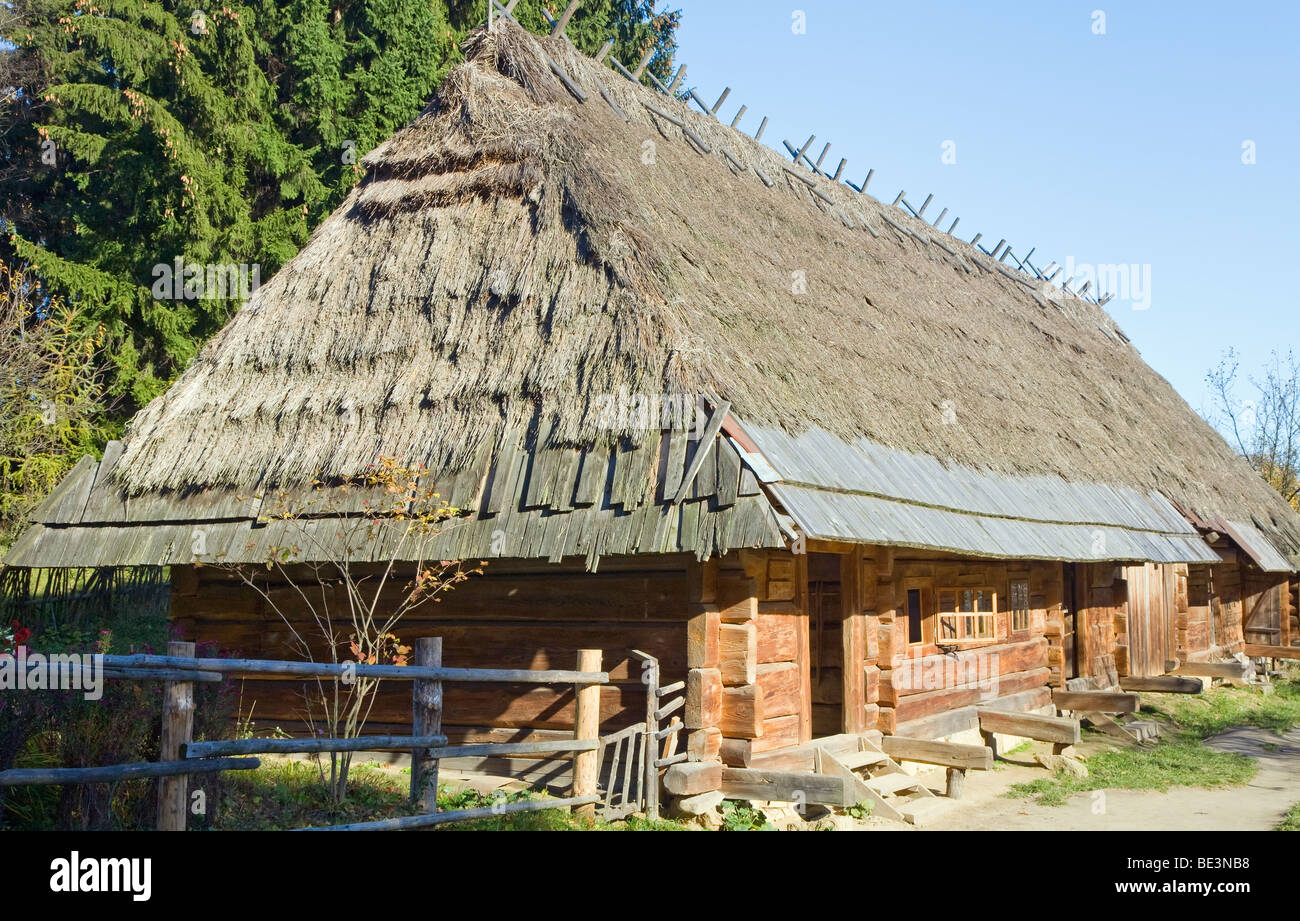 Ukrainian historical country wooden hut with thatched roof Stock Photo ...
