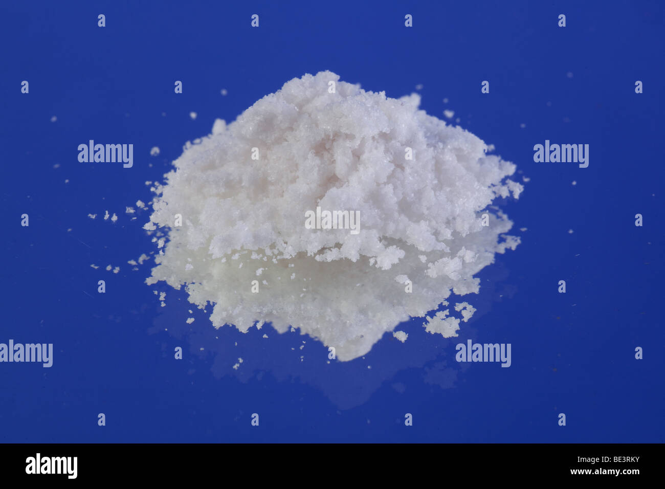 Mephedrone 4-methylmethcathinone (4-MMC) powder with a blue studio background. A legal high ...