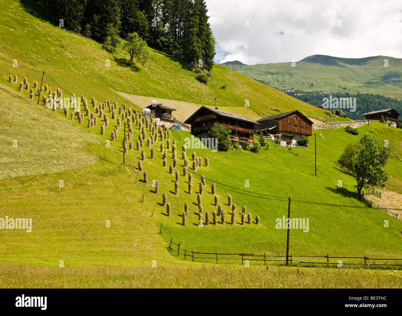 Mountain farmhouse in the steep meadow slope hi-res stock photography ...