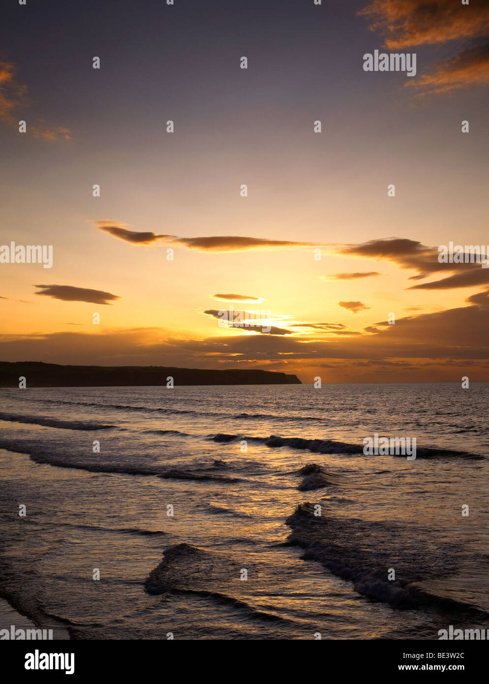 Sunset over sea waves hi-res stock photography and images - Alamy
