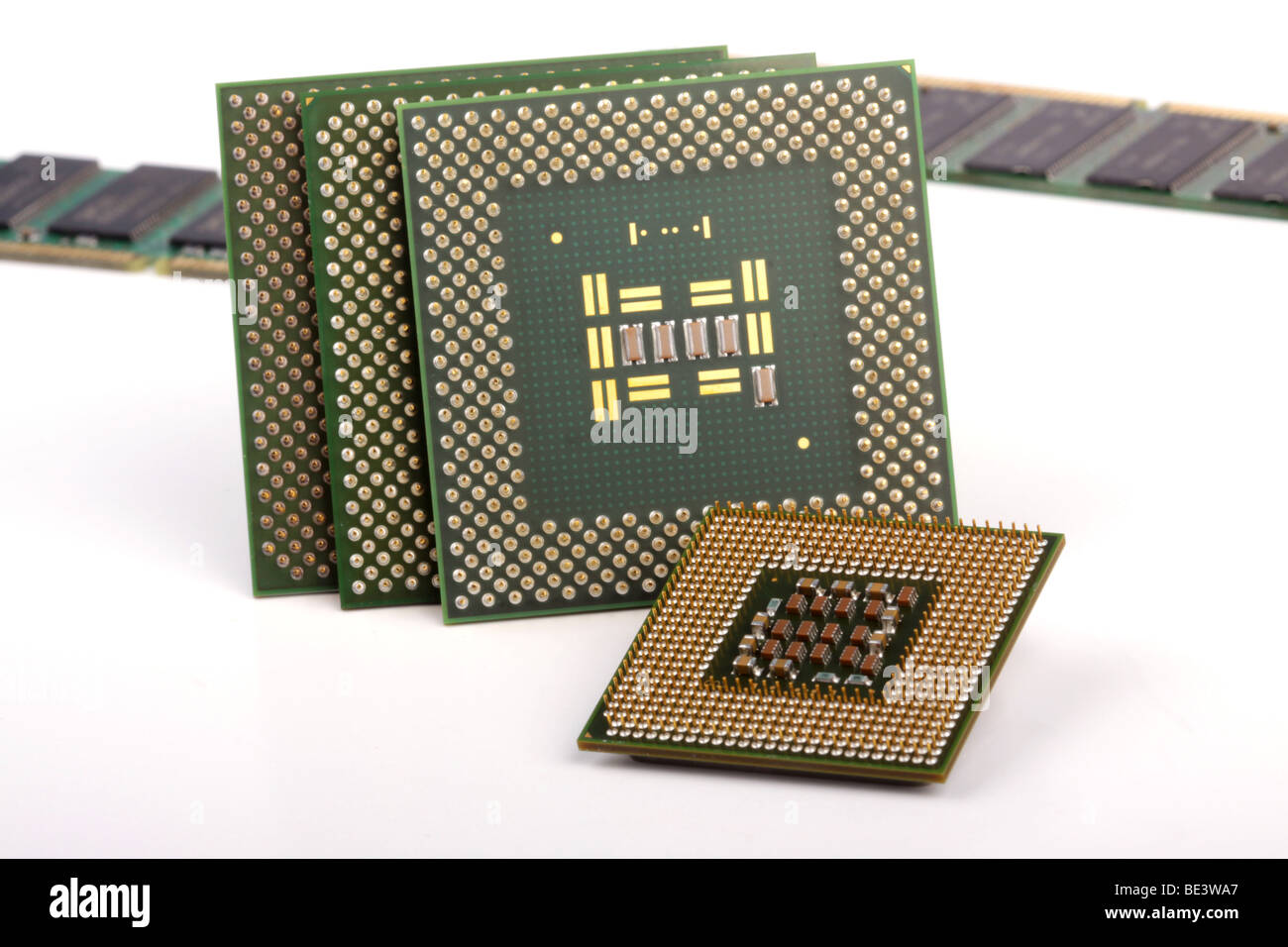 Several computer chips on a white background Stock Photo - Alamy