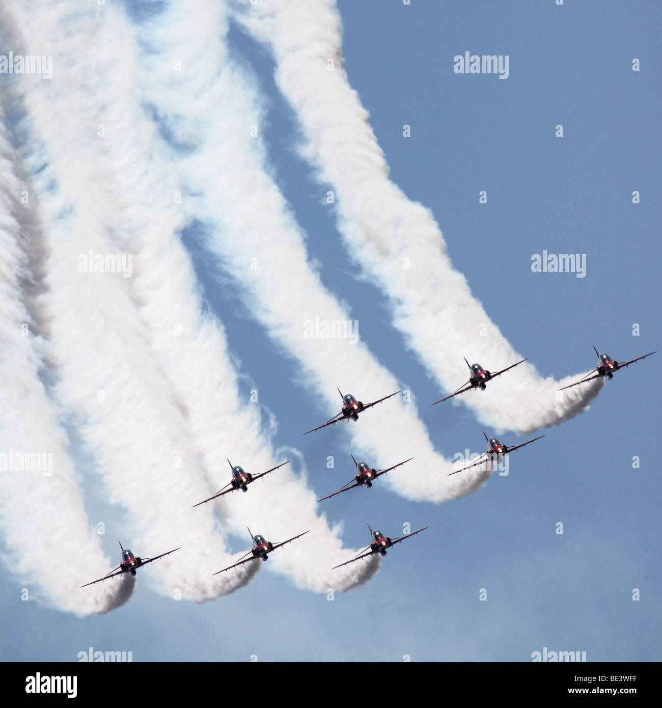 aerobatics team flying in formation with smoke Stock Photo - Alamy