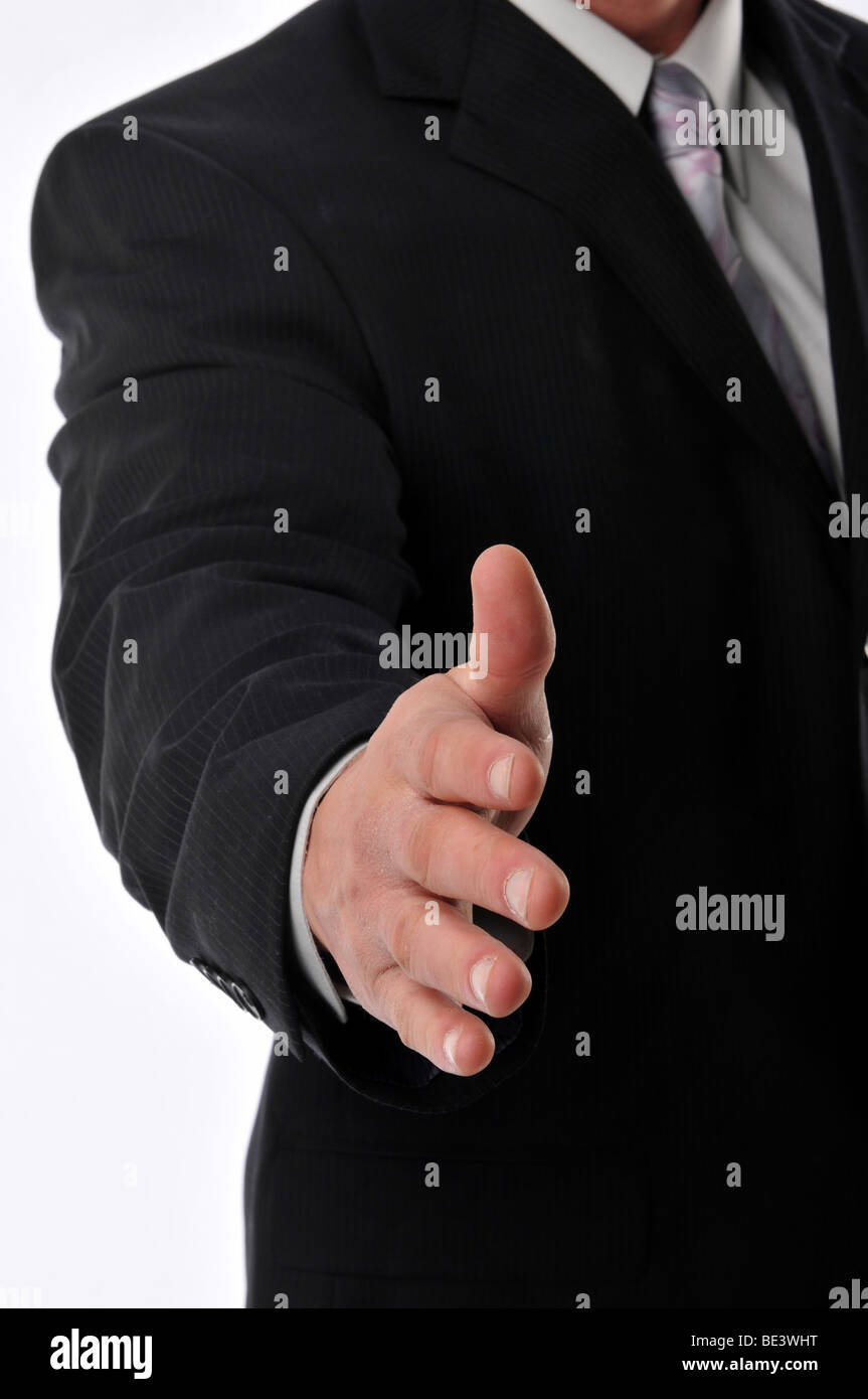 Businessman offering a handshake isolated on a white background Stock ...