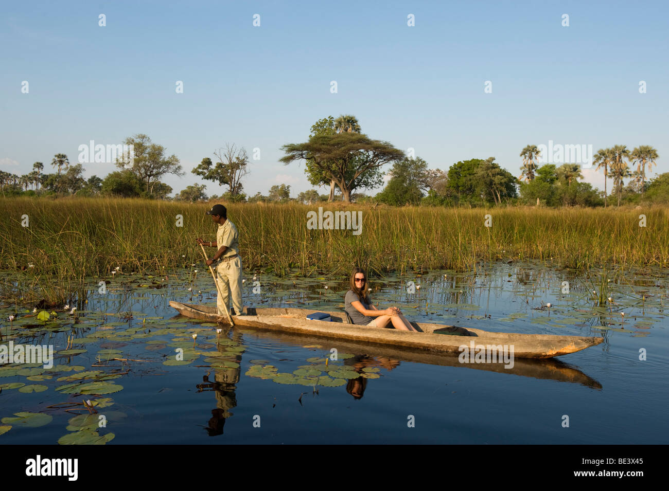 Tourist on mokoro trip, Okavango Delta, Botswana Stock Photo - Alamy