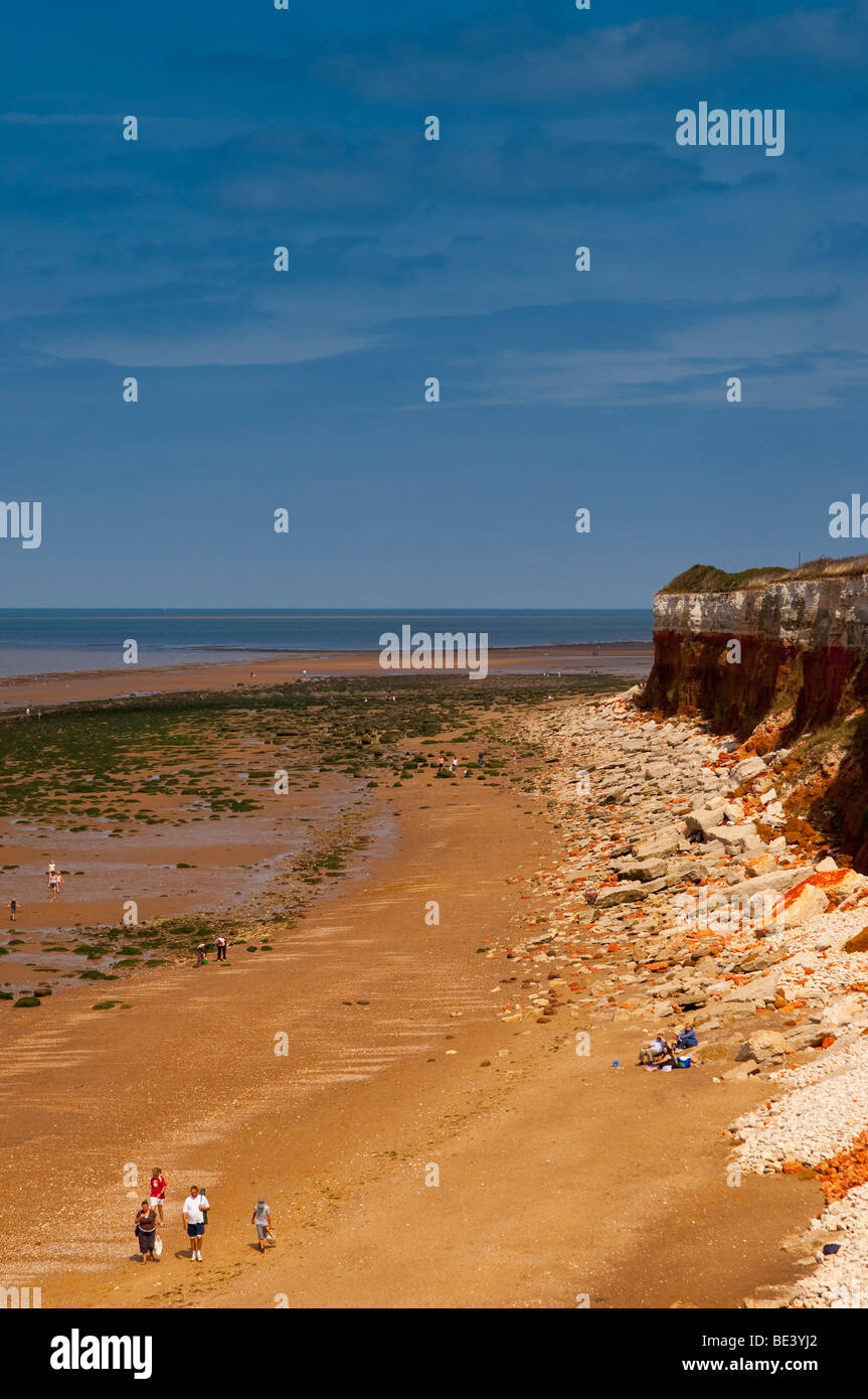 The beach and cliffs with people at Hunstanton , North Norfolk , Uk ...