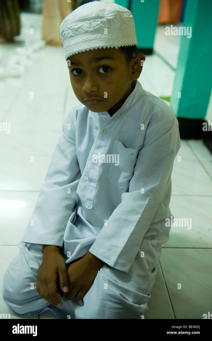 Muslim boy at the mosque Stock Photo - Alamy