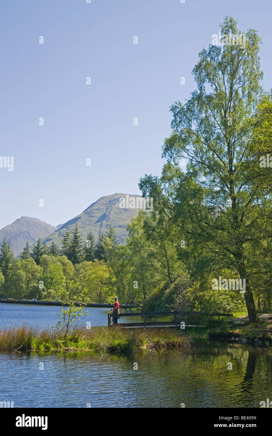 Glencoe Lochan, fisherman, Glencoe forest, River Coe, Highland Region ...