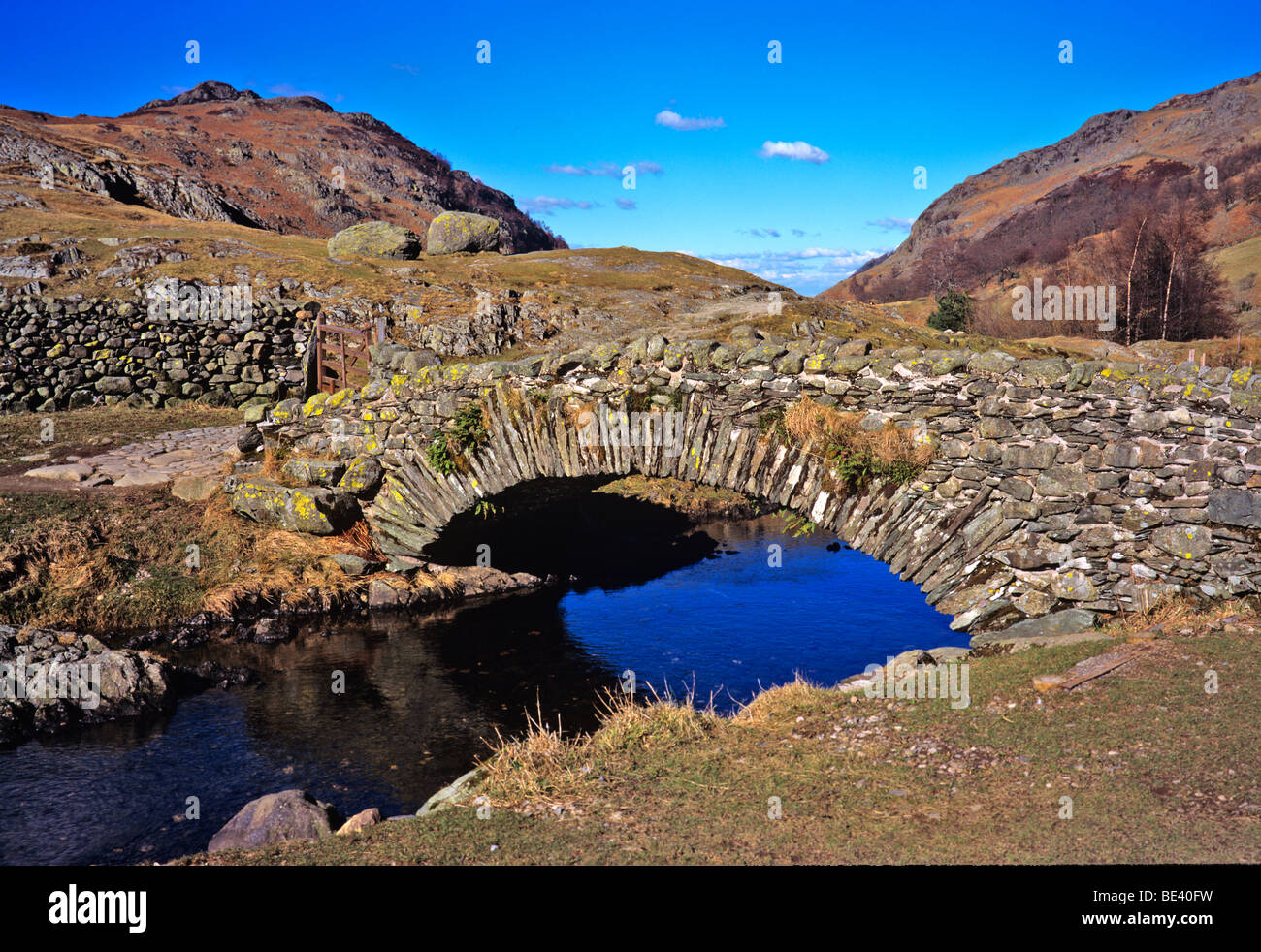 A old stone footbridge in the Lake District Stock Photo - Alamy