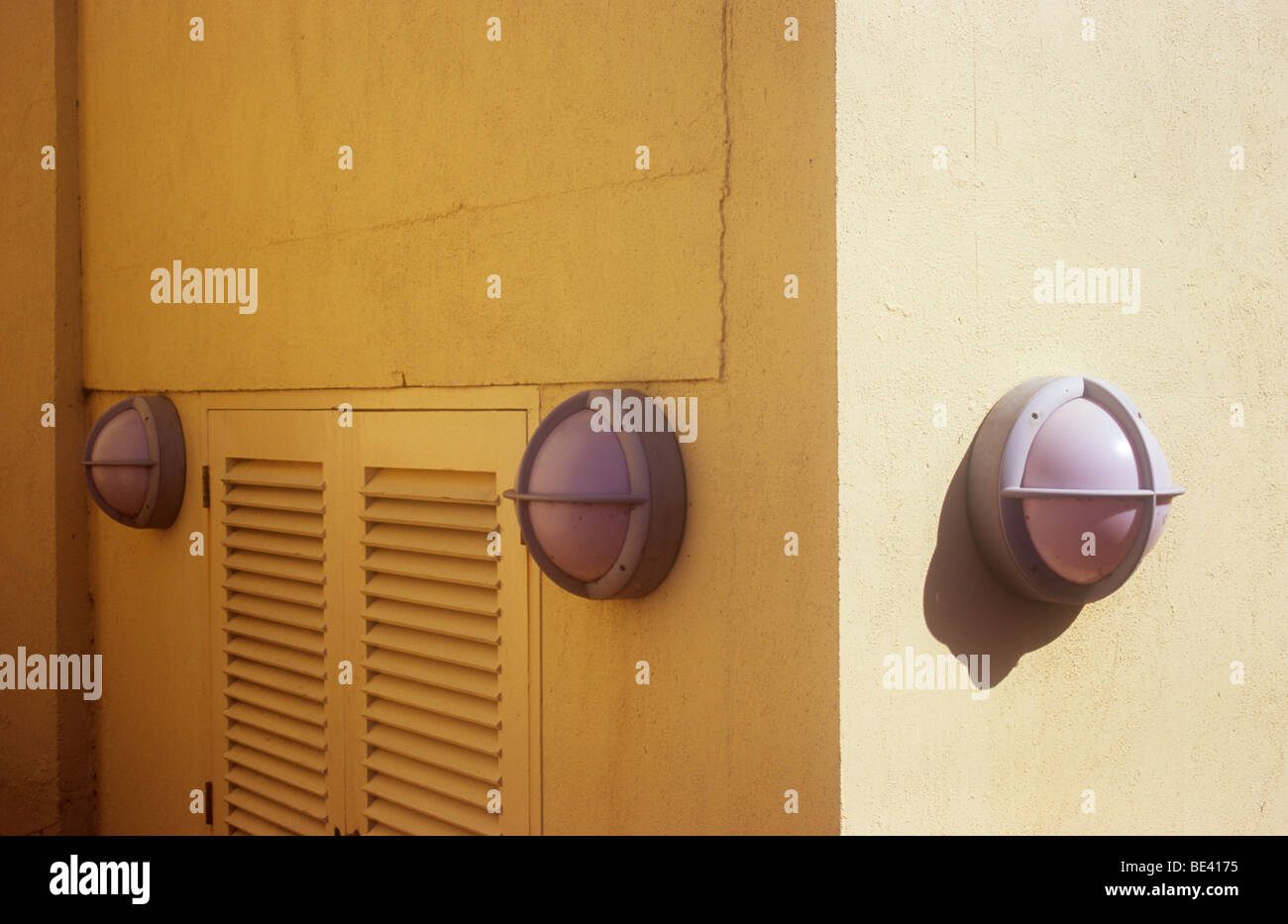 Architectural detail of corner of building part in direct sunlight part ...