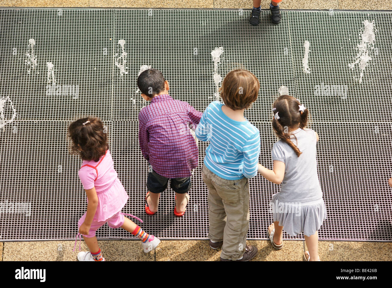 Children frolicking hi-res stock photography and images - Alamy