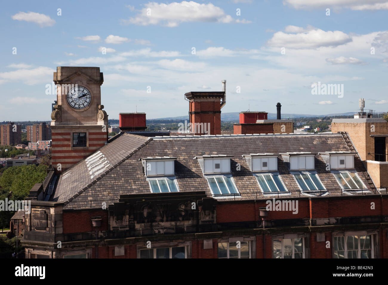 Dantzic Street, Manchester, England, UK, Europe. Rooftops with clock ...