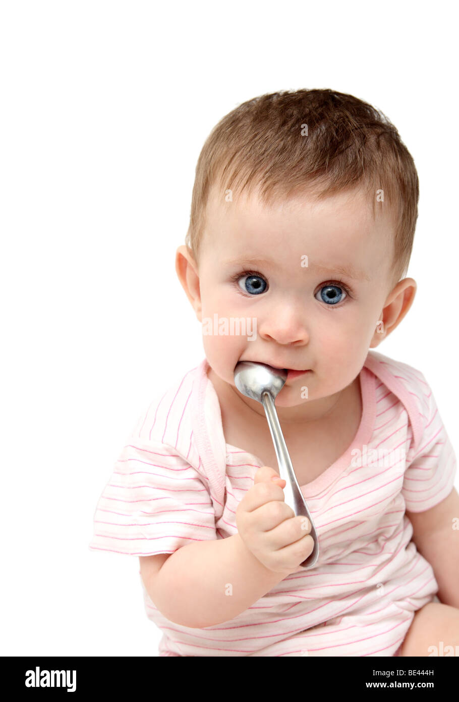baby sucking spoon close-up portrait Stock Photo - Alamy