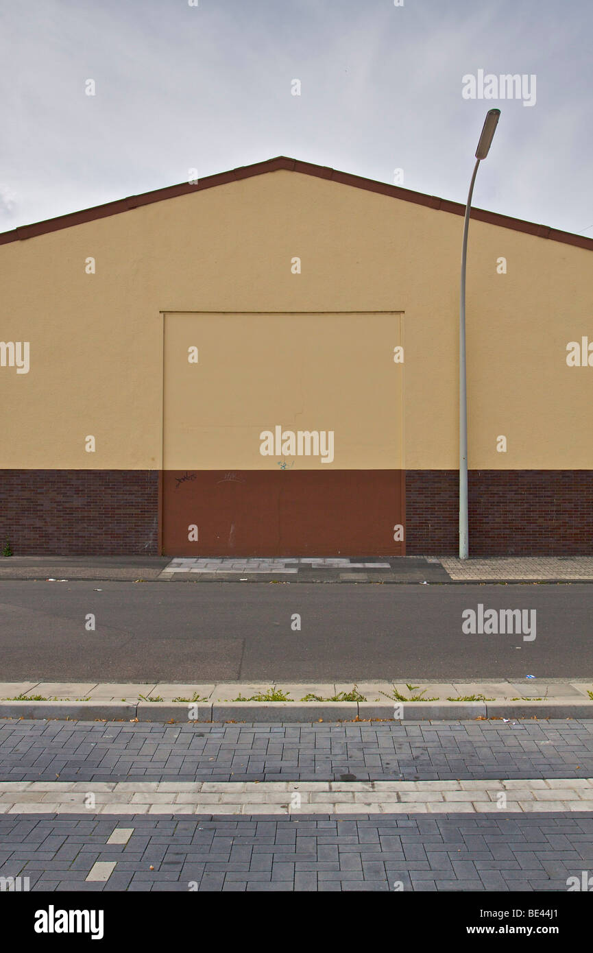 Bricked-up gates of a former factory building Stock Photo - Alamy