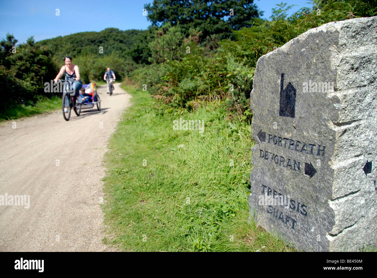 Cyclists on the Cornwall Coast to Coast cycling trail an old tramroad ...