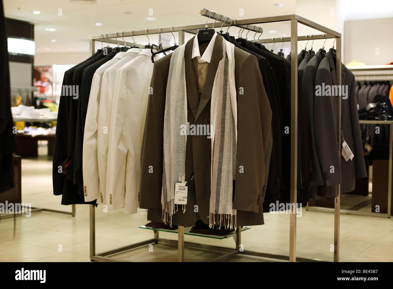jackets in a men fashion store Stock Photo - Alamy