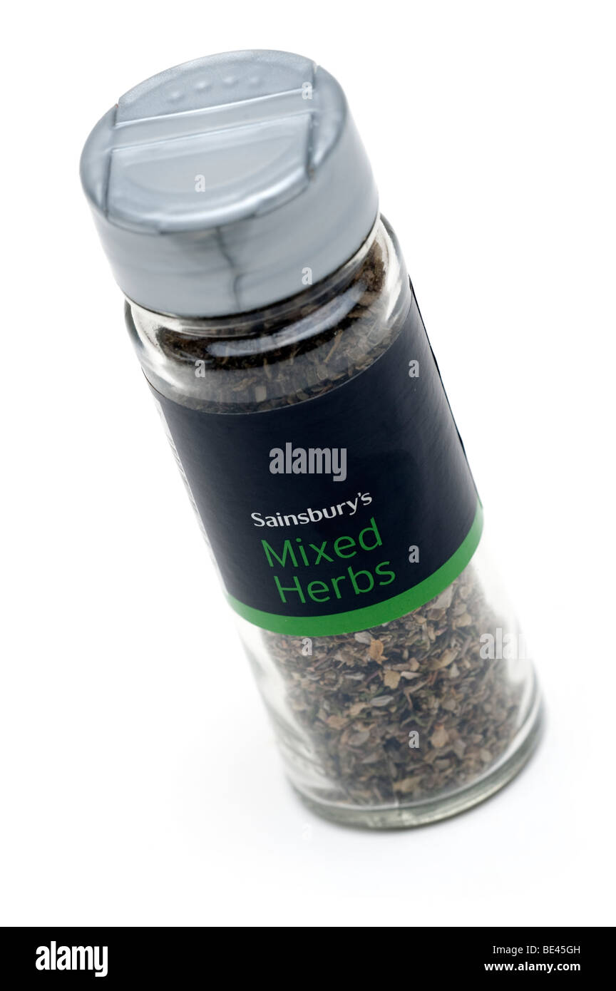 Small glass container of mixed herbs Stock Photo - Alamy