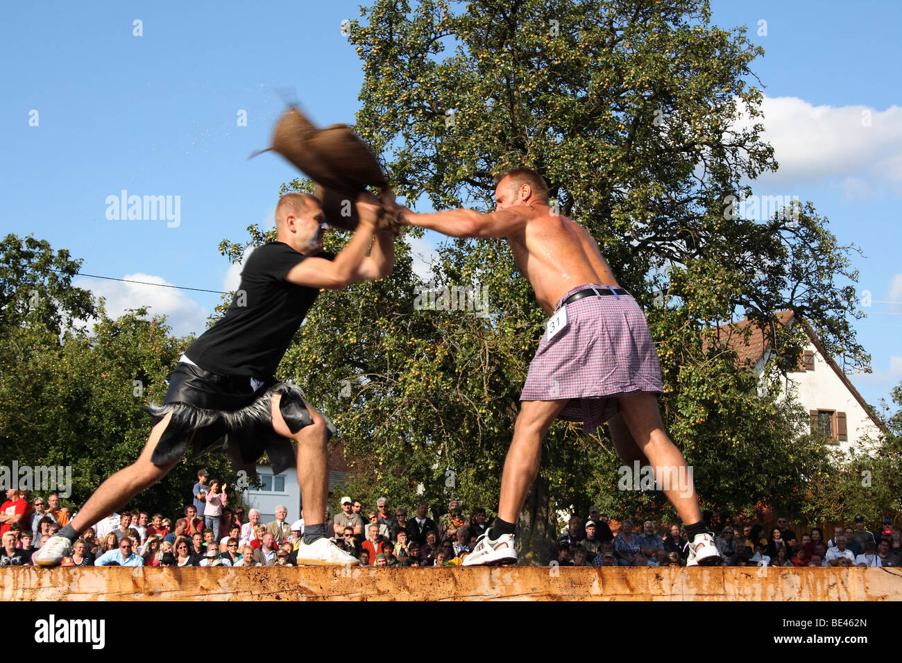 Discipline straw sack competition, straw sacks are used to push the the ...