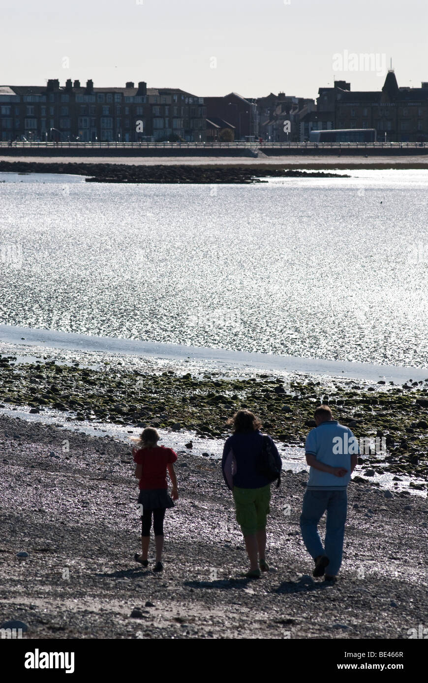Walking along the sea front at Morecambe Stock Photo - Alamy