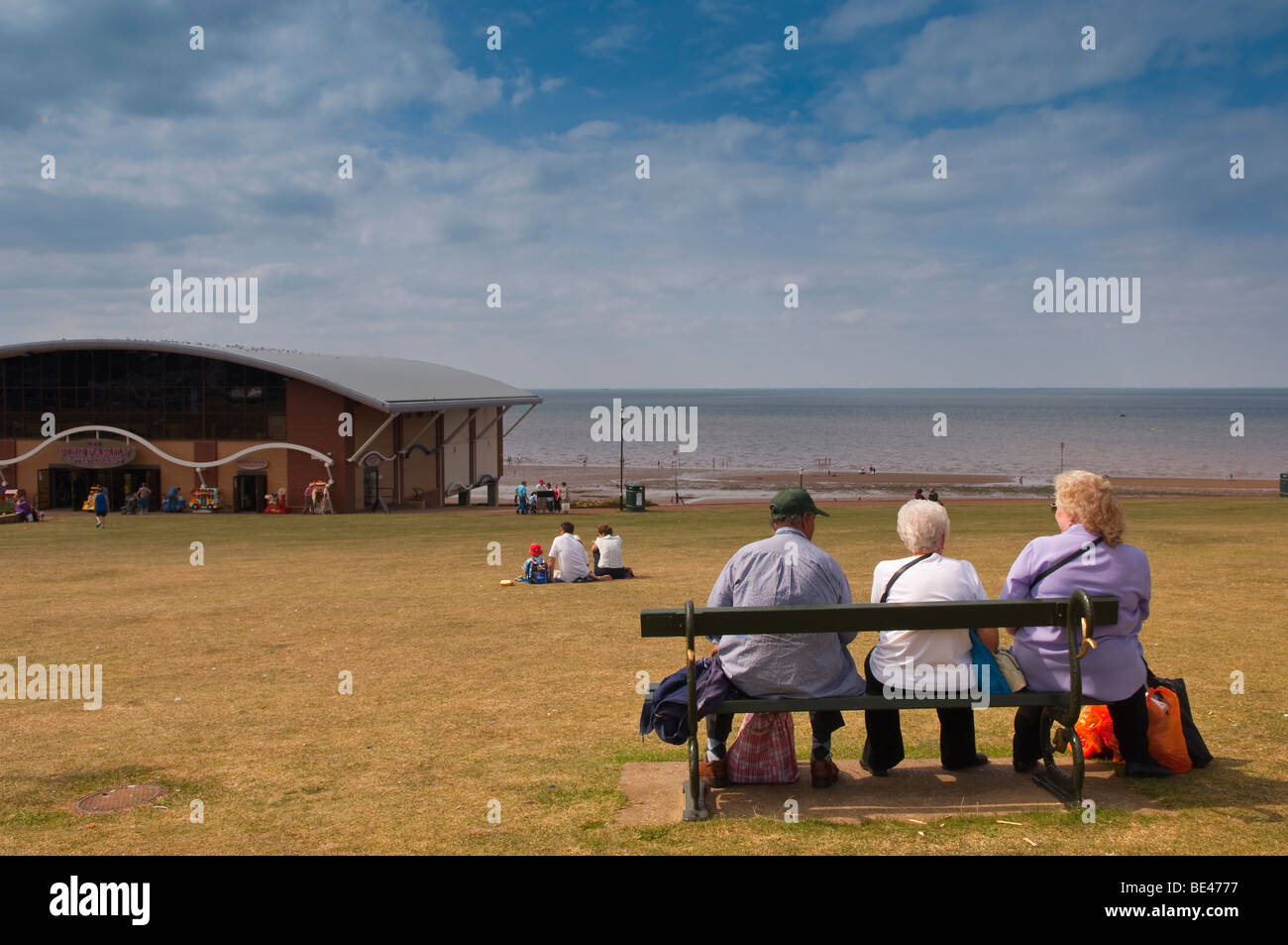 Oaps Sitting On A Bench Looking Out To Sea High Resolution Stock ...