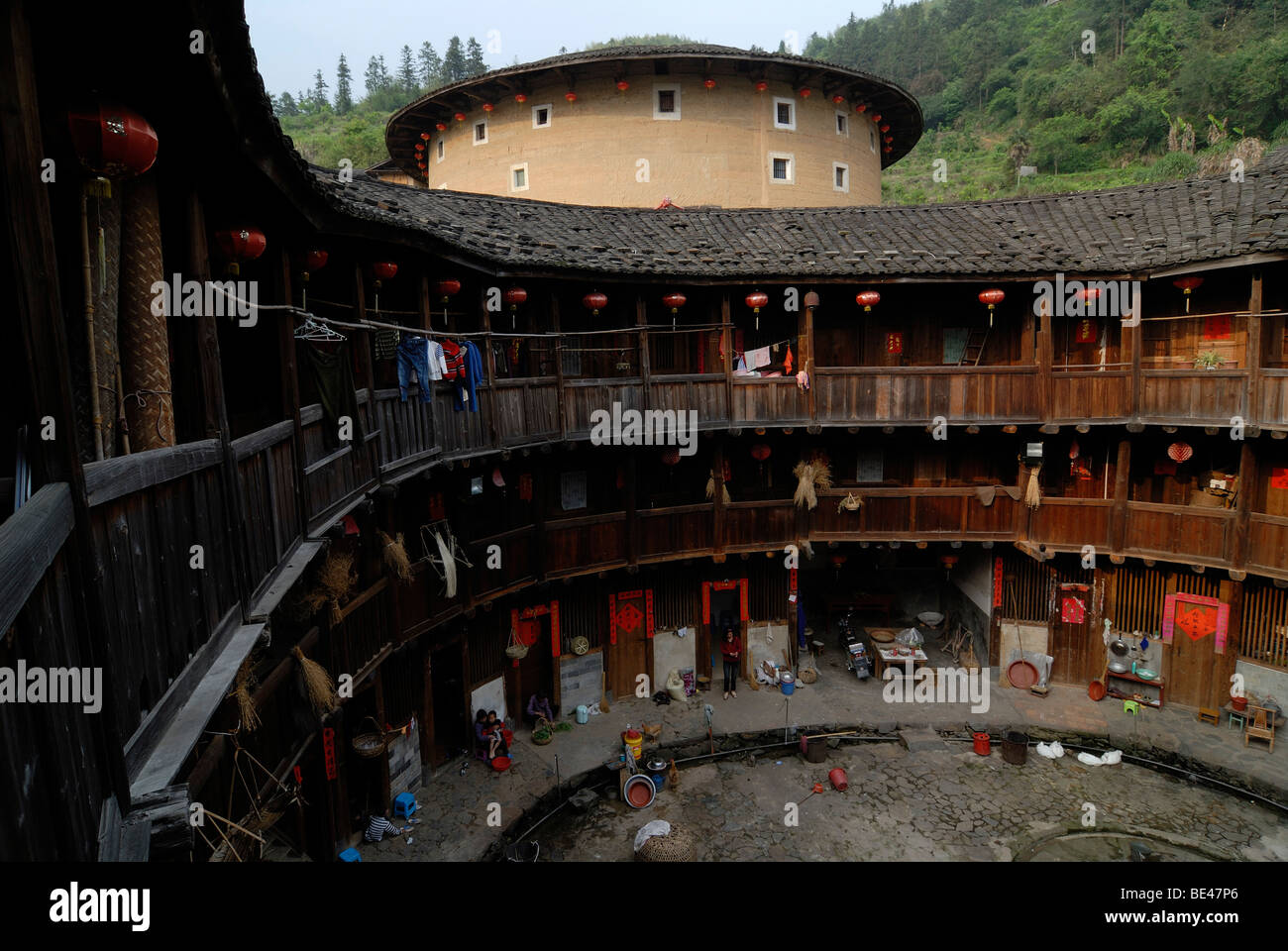 Round courtyard of a Tulou round house, dirt round houses, adobe round ...