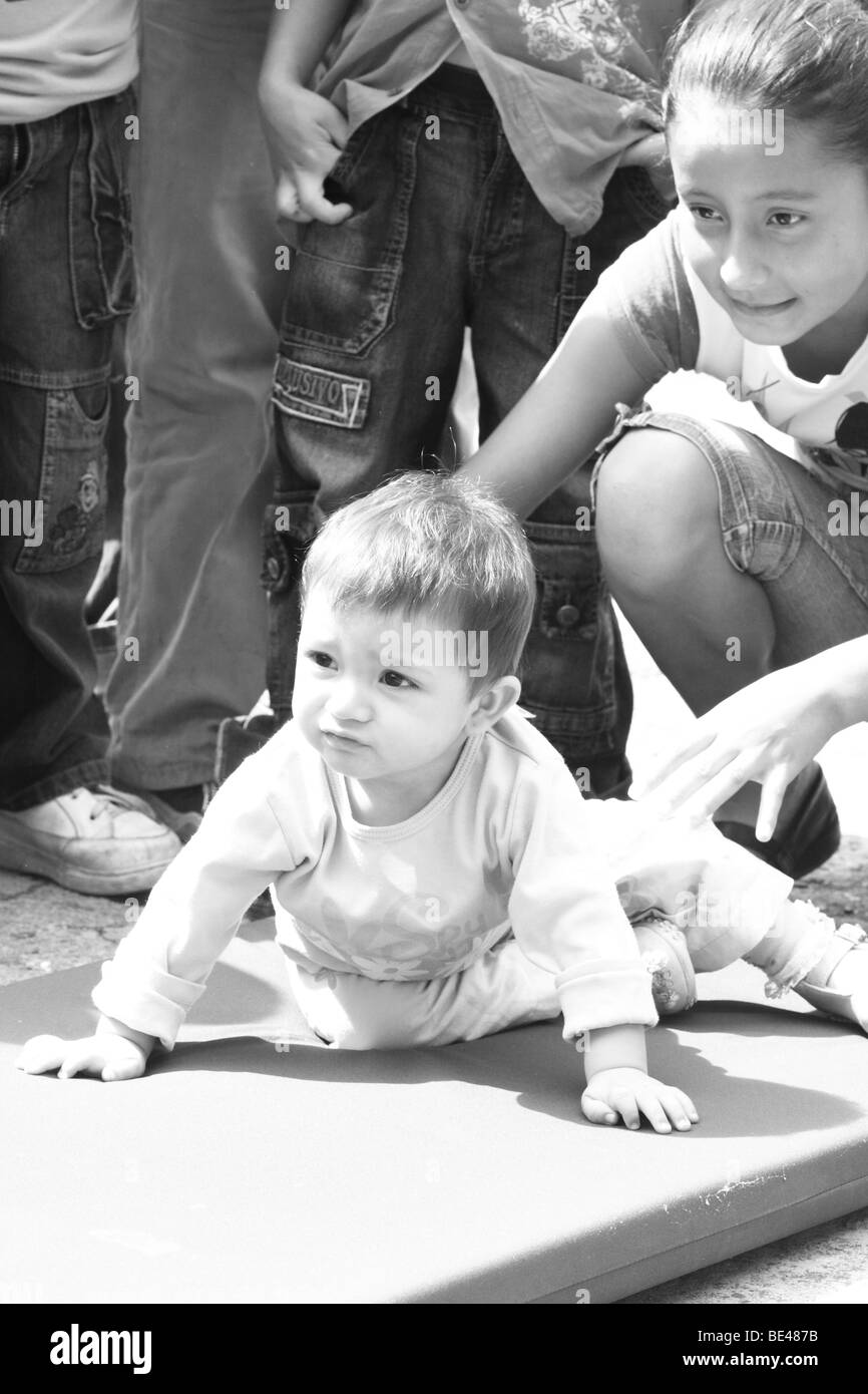 Young woman teaching her child movement exercises. Coper, Boyacá, Colombia, South America Stock ...