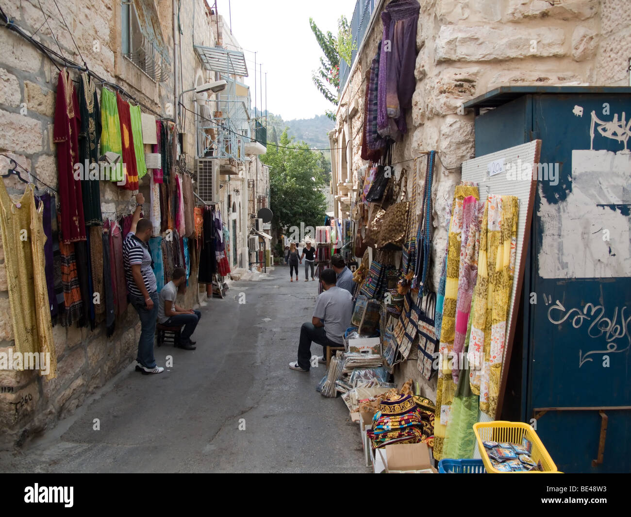 Peddlars awaiting tourists to sell their merchandise in Ein-Karem ...