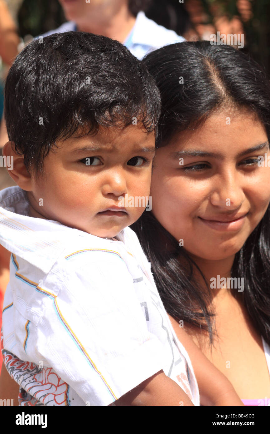 Woman with child in her arms. Coper, Boyacá, Colombia, South America Stock Photo - Alamy