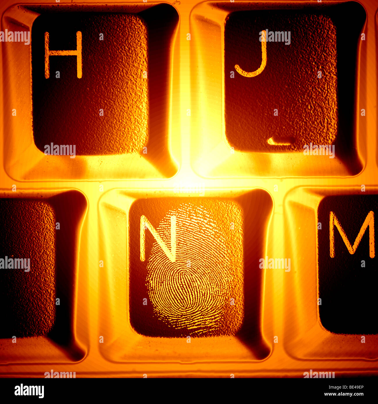 fingerprint on keyboard key illustrating identity theft Stock Photo - Alamy