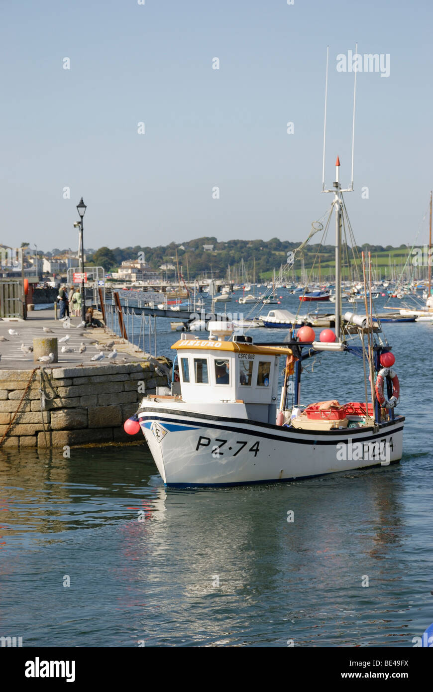 Fishing Boat returns to Falmouth Stock Photo - Alamy