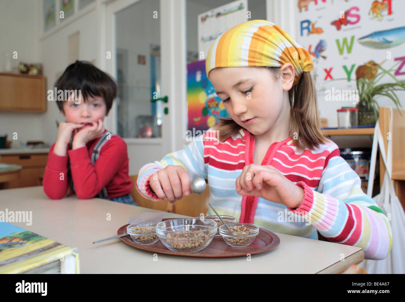 Children playing at day-care center Stock Photo - Alamy