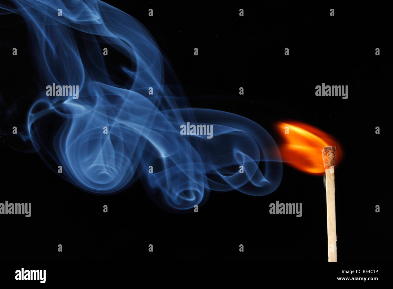 Lit match, flame, blue smoke Stock Photo - Alamy