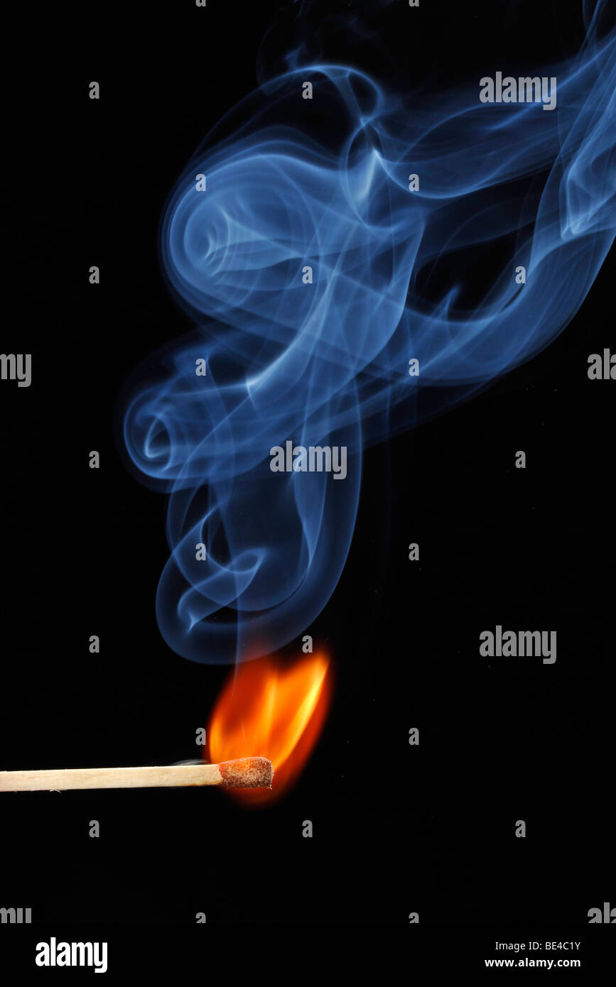Lit match, flame, blue smoke Stock Photo - Alamy