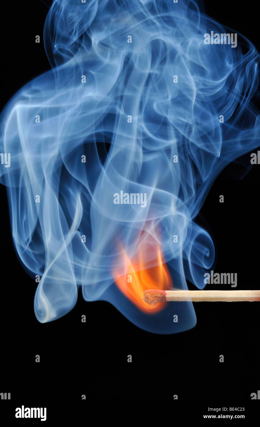 Lit match, flame, blue smoke Stock Photo - Alamy