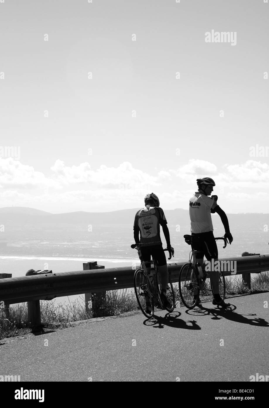 Two cyclists on cycle Black and White Stock Photos & Images - Alamy