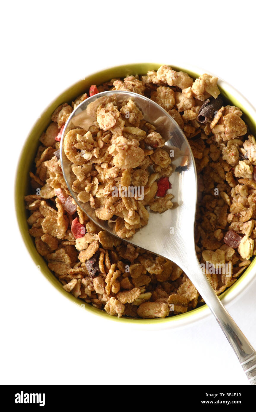 Musli in a cup with spoon Stock Photo - Alamy