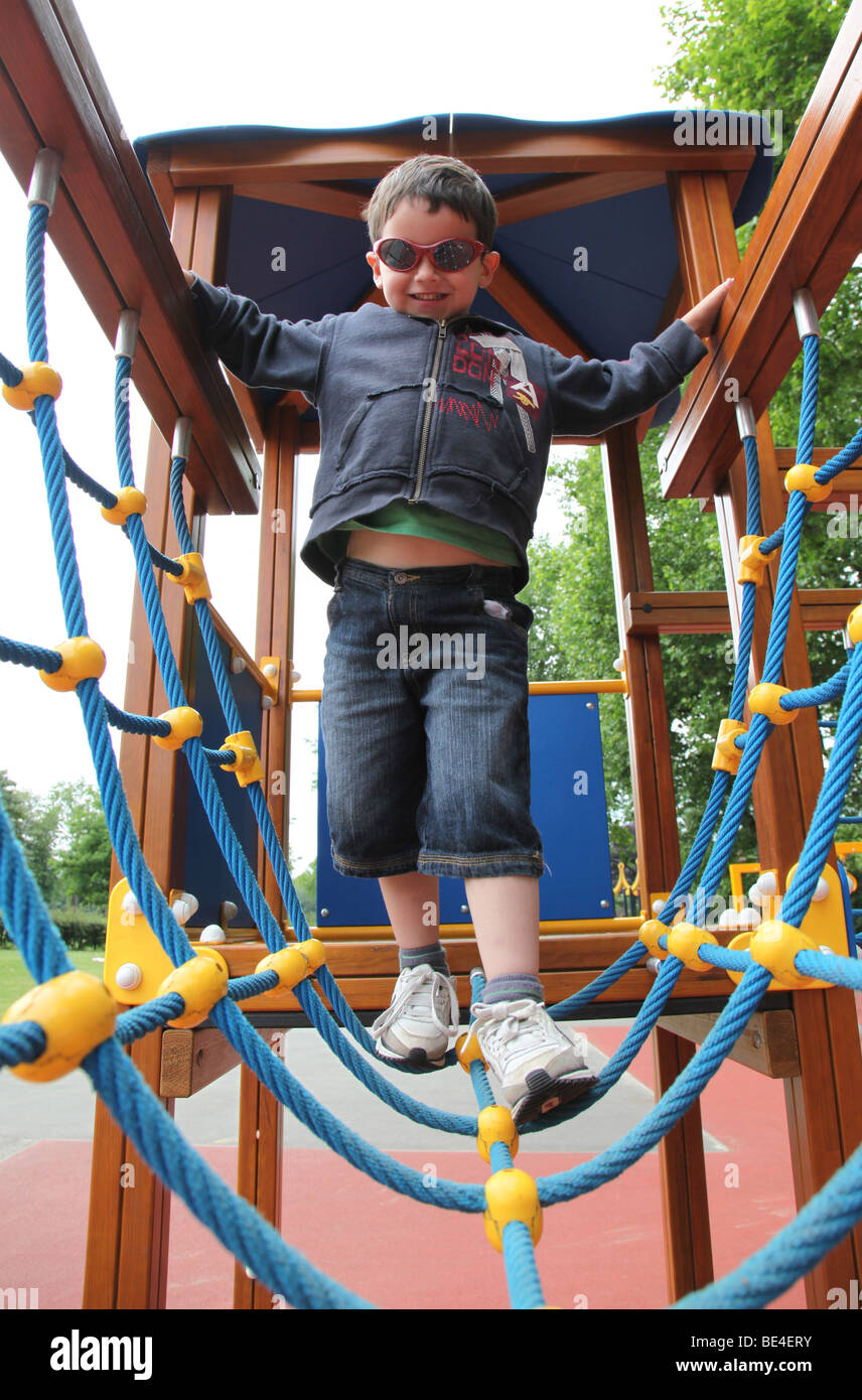 4 year old boy playing alone in Greenwich Park Stock Photo - Alamy