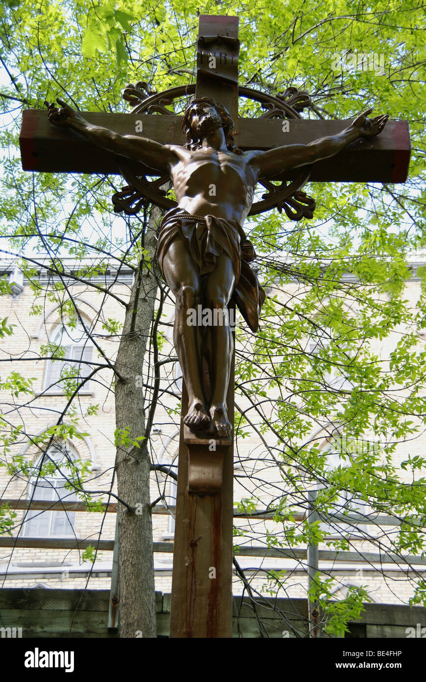 Rust by Jesus' feet resembles blood at a cross by stations of the cross ...