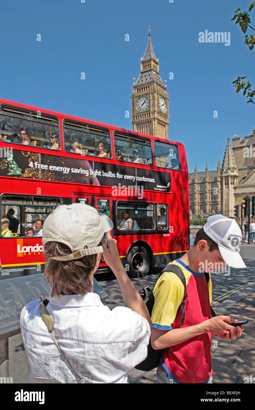 teenage boy taking a photo of Big Ben, London Stock Photo - Alamy